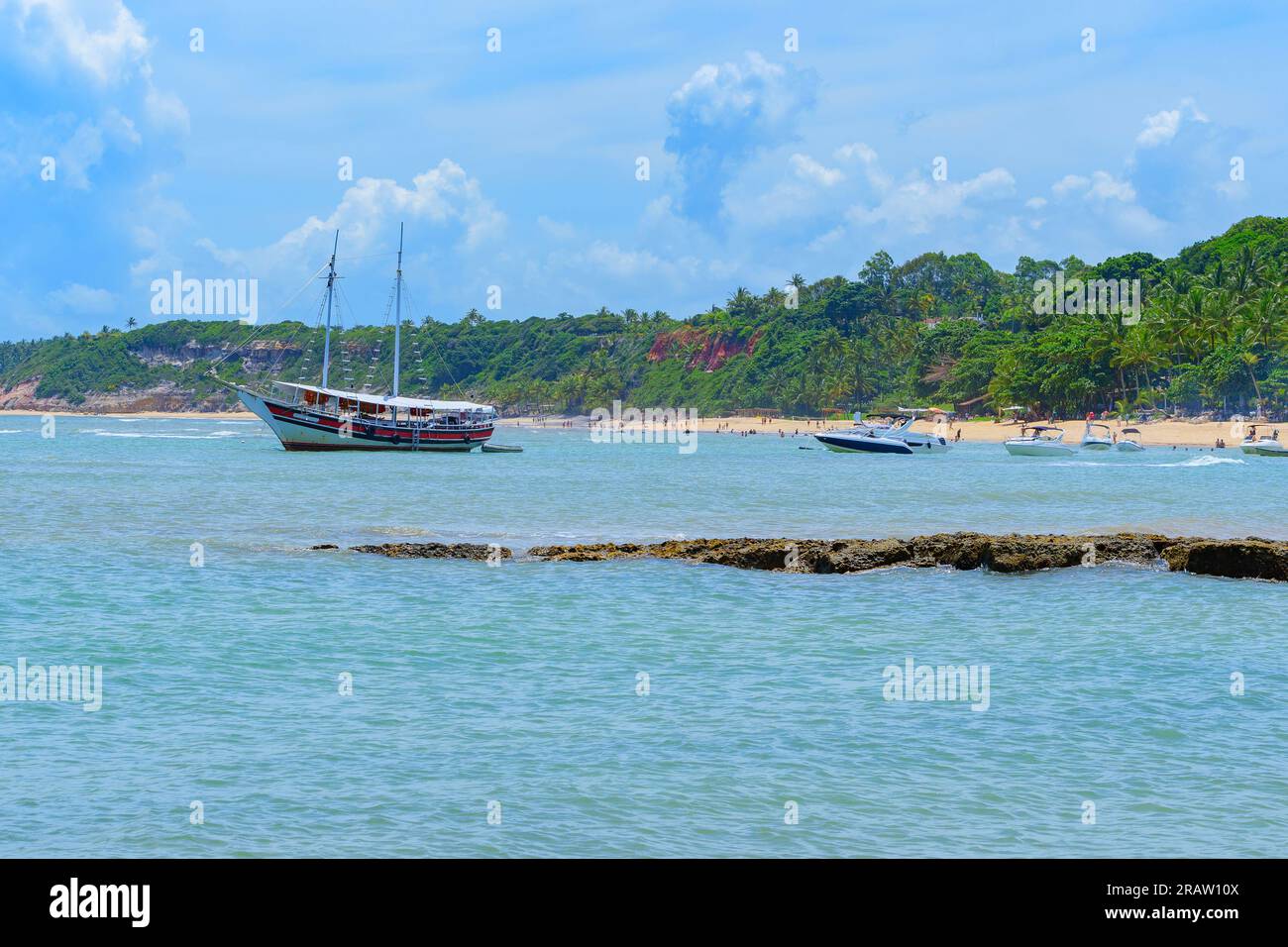 Tourist boats on the sea of Espelho Beach, a beautiful tourist beach of ...