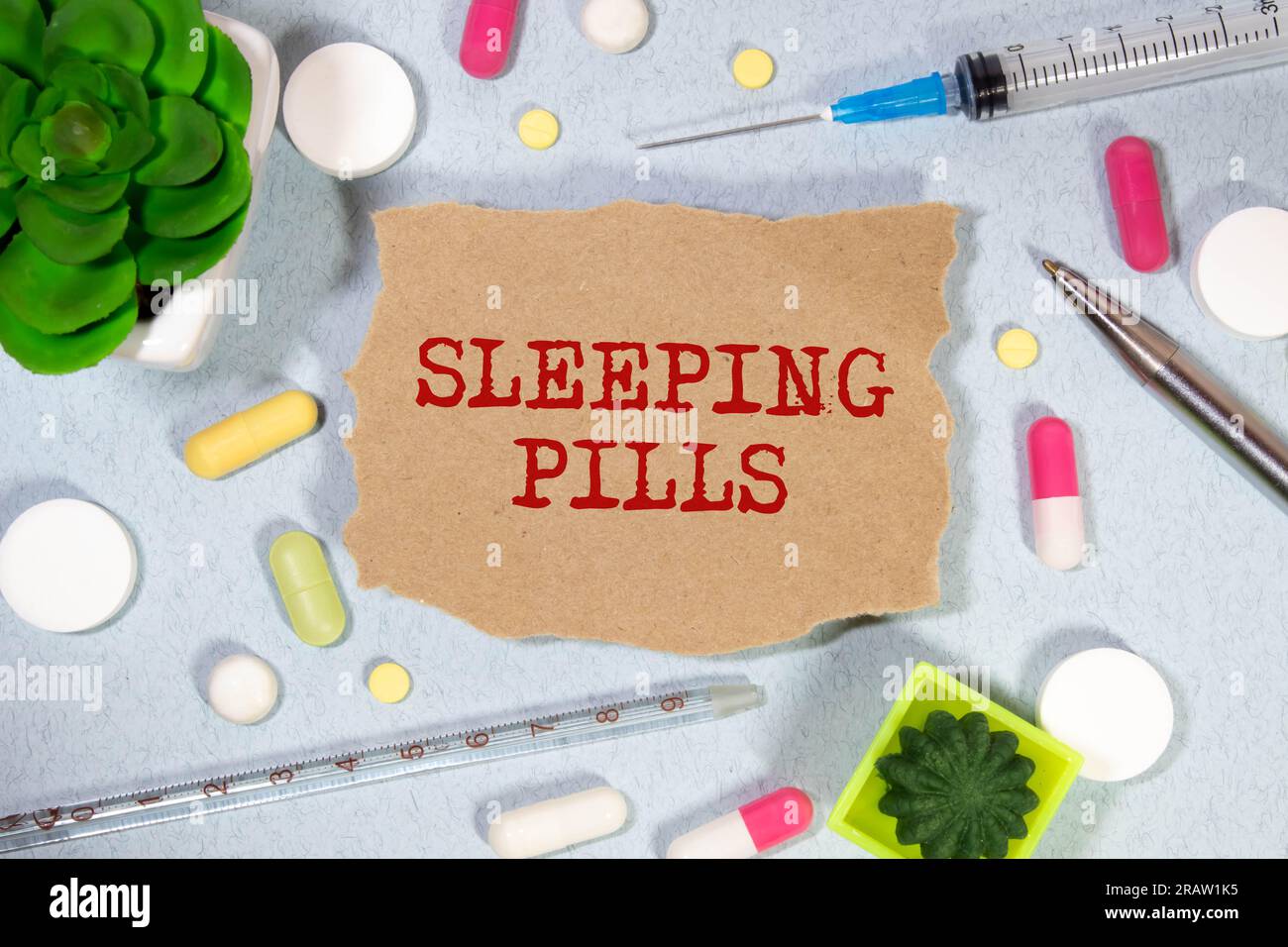 SLEEPING PILLS text on a letterhead in a medical folder on a beautiful ...