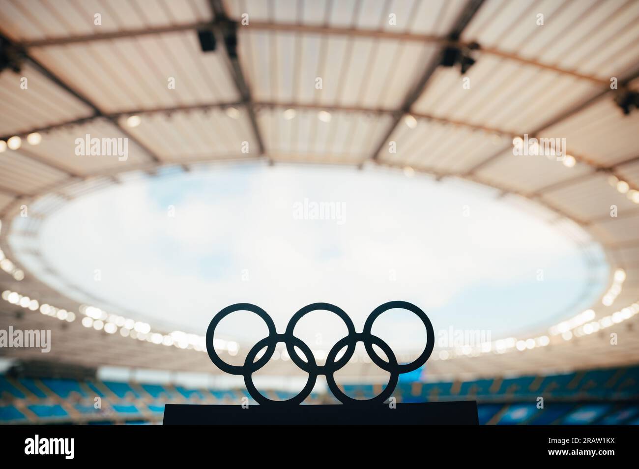 PARIS, FRANCE, JULY 7, 2023: Silhouette of Olympic Rings Reflecting on ...