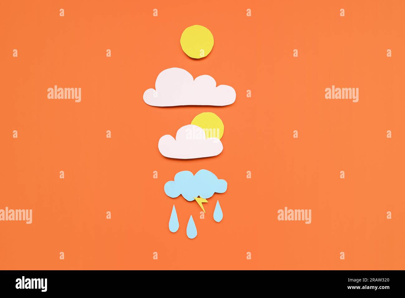 Paper sun with clouds and rain drops on red background. Weather ...