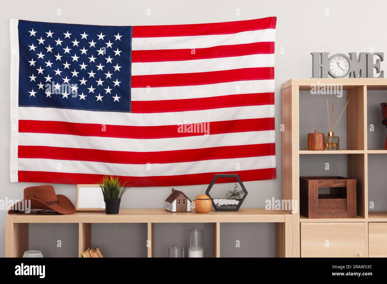 Interior of modern living room with hanging USA flag Stock Photo - Alamy