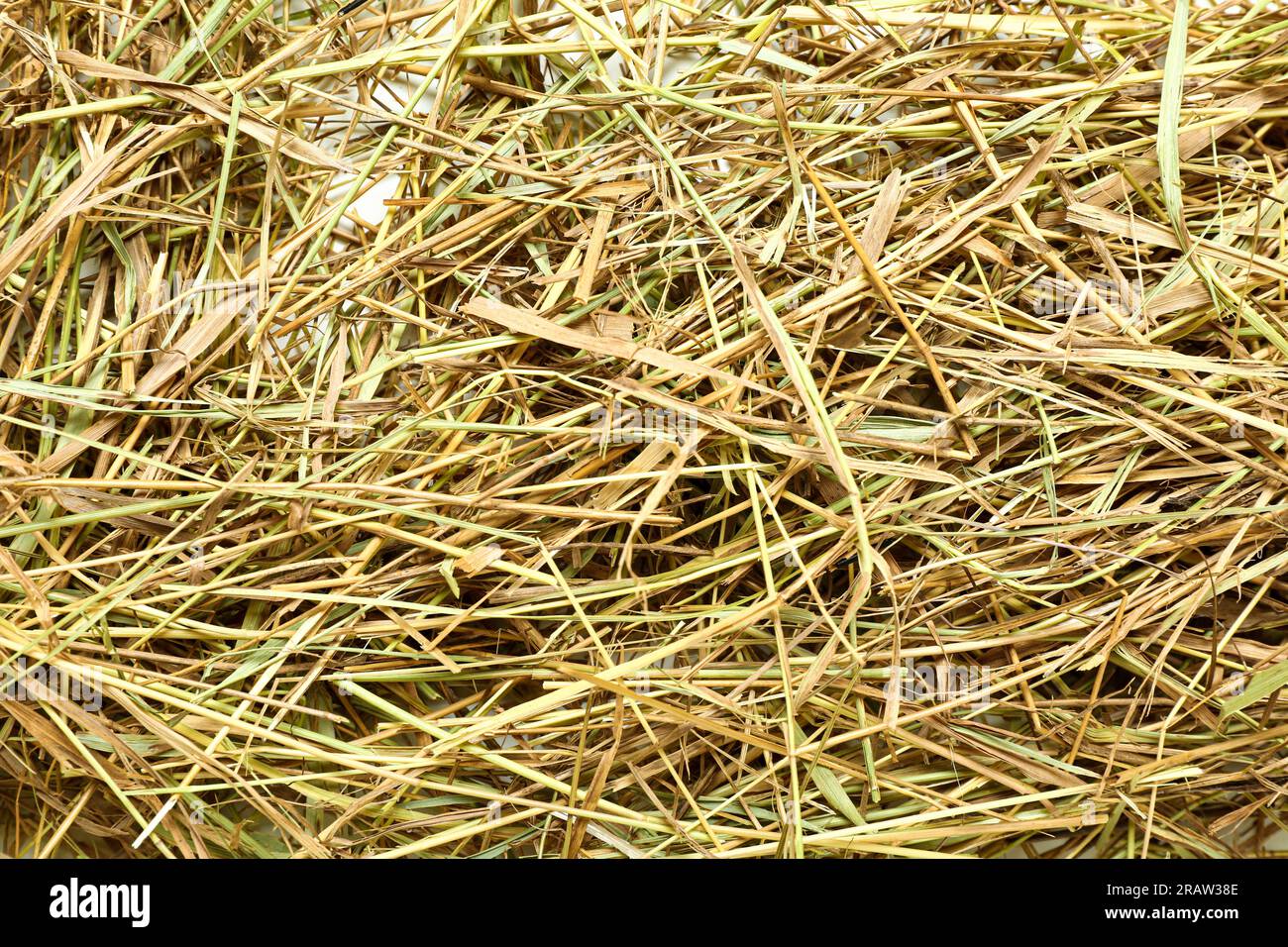 Heap of straw as background Stock Photo - Alamy