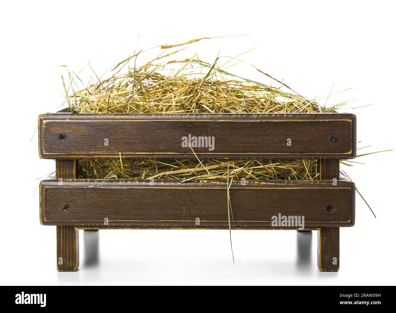 Straw in crate on white background Stock Photo - Alamy