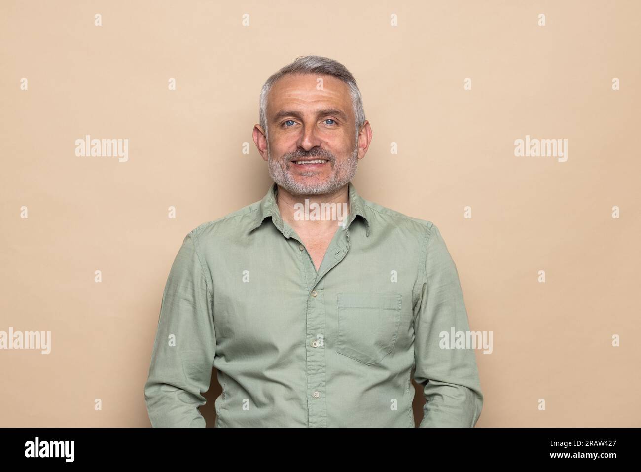 Close-up portrait of nice cheerful content middle aged man copy space ...