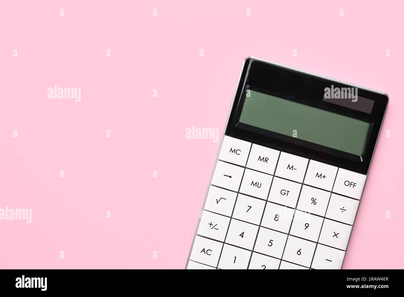 Modern calculator on pink background Stock Photo - Alamy