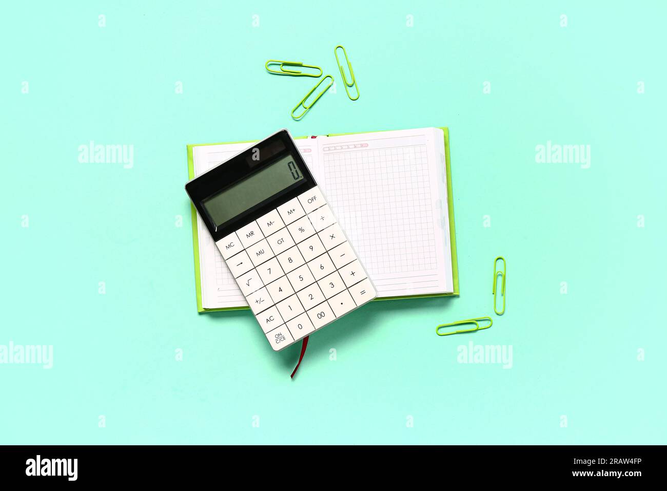 Modern calculator with stationery on turquoise background Stock Photo ...