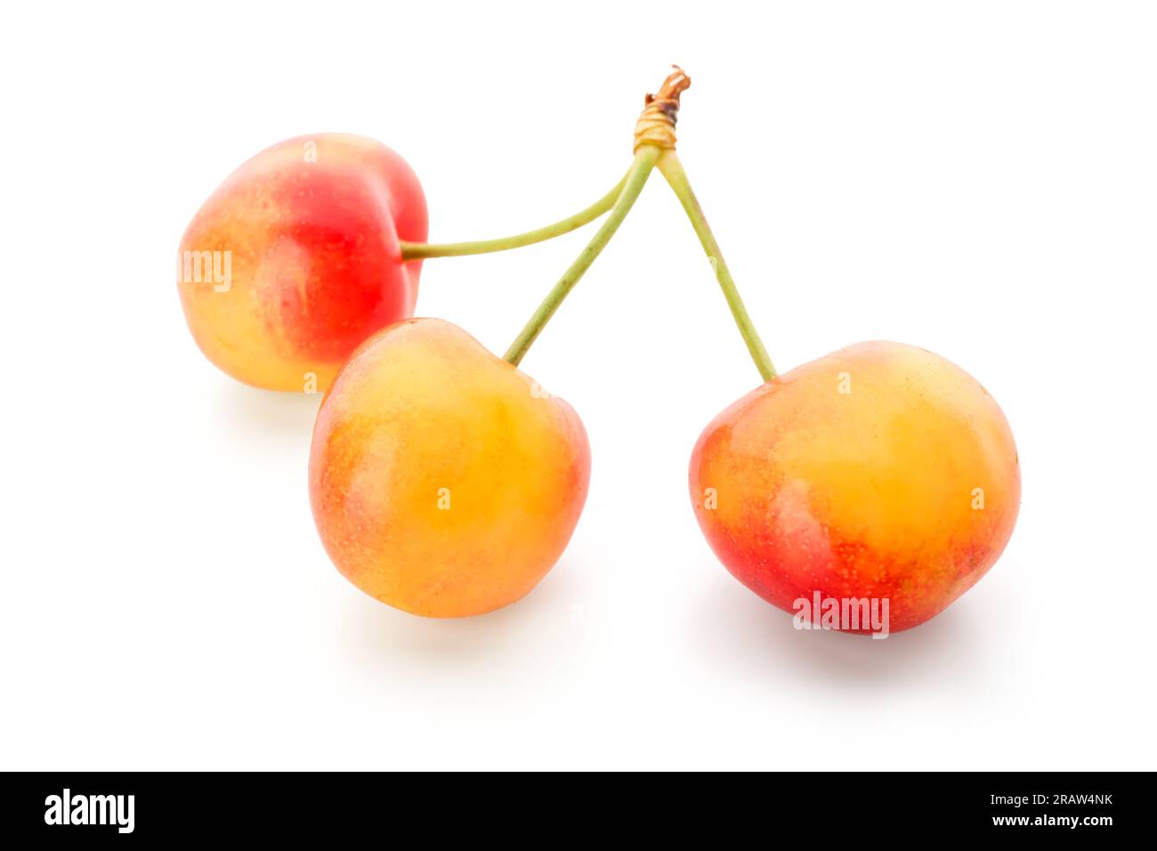 Sweet yellow cherries on white background Stock Photo - Alamy