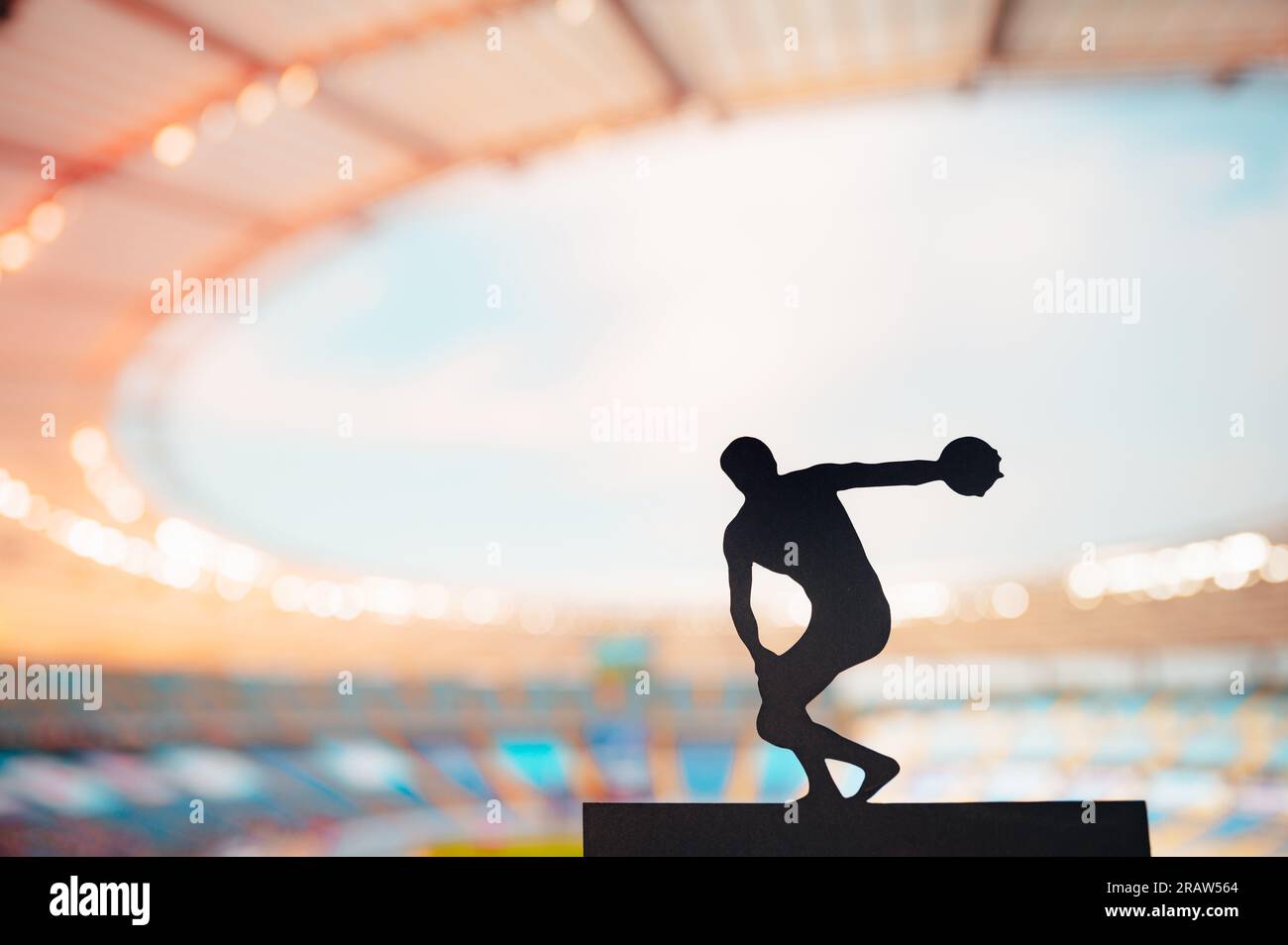 Silhouette of Athlete, Propelling Discus through Majestic Evening Sky ...