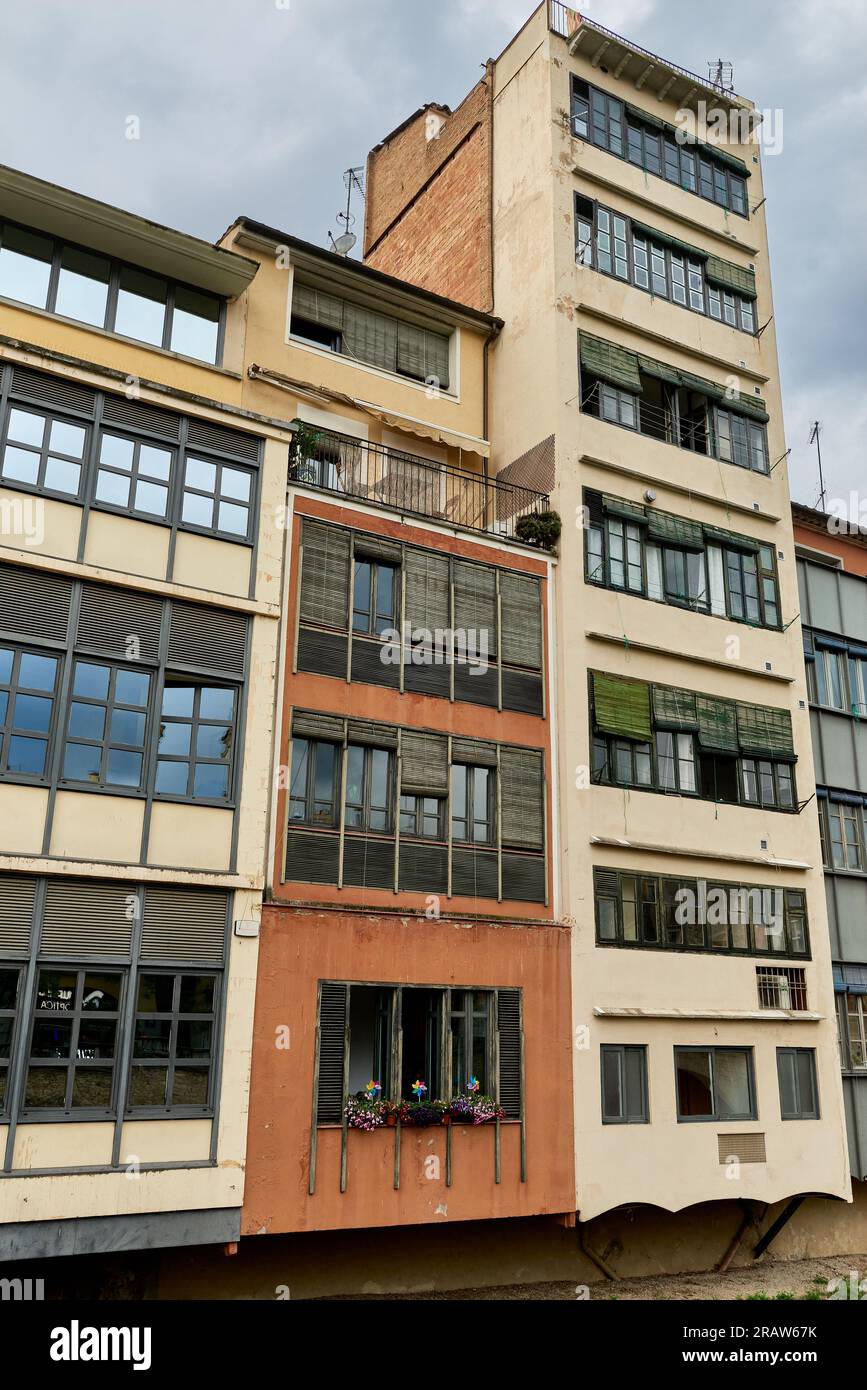 Lgbt signs on a window of appartment of residential building. Rainbow ...