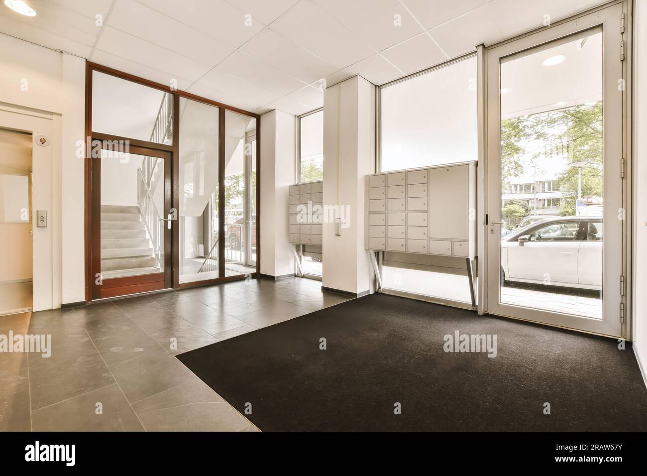 the inside of a building with doors open and windows in place where ...