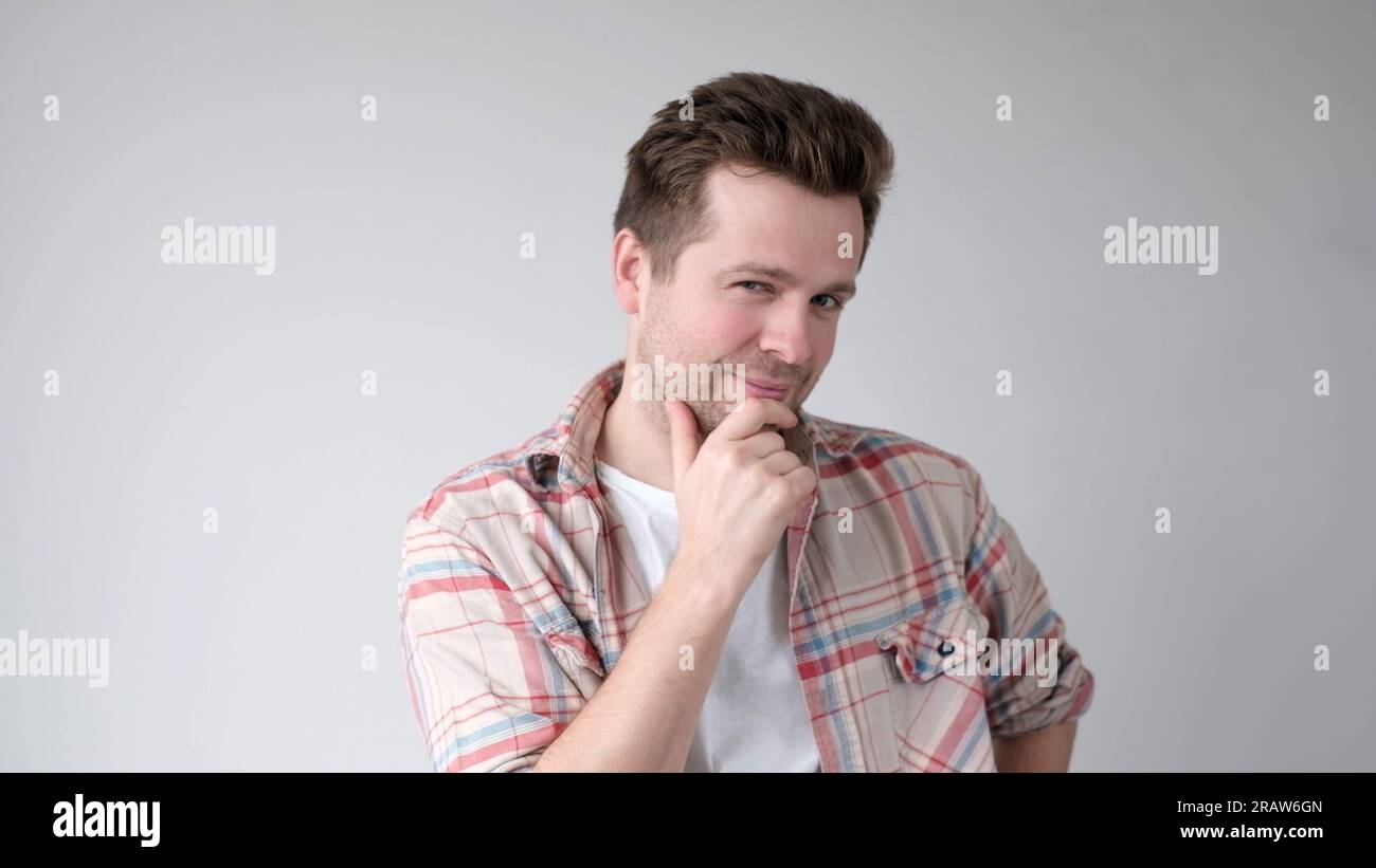 Man scratching his chin hi-res stock photography and images - Alamy