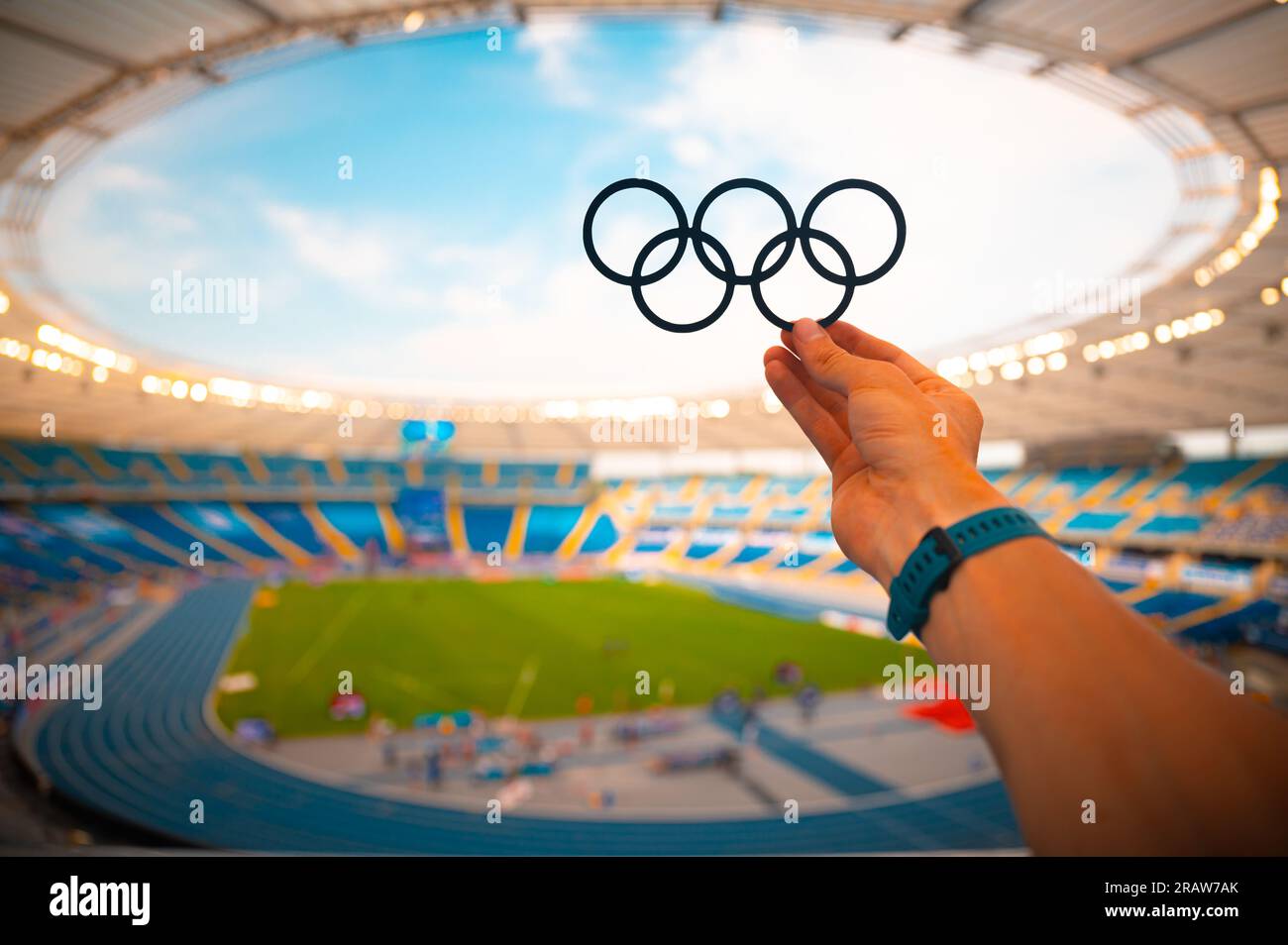PARIS, FRANCE, JULY 7, 2023: Athlete's Reverence for Olympic Rings at ...
