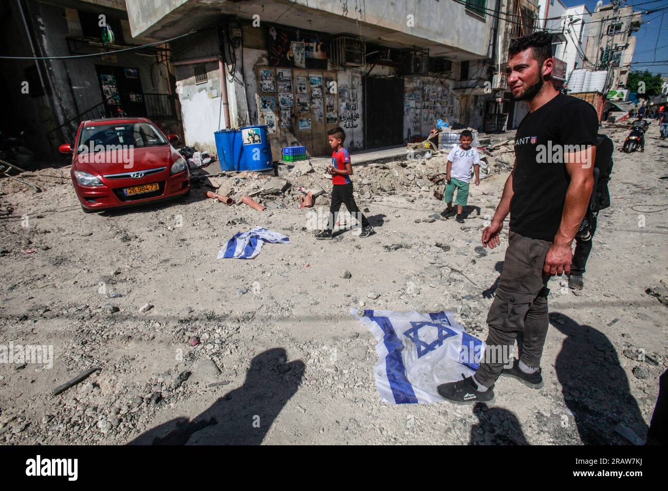 Jenin, Palestine. 05th July, 2023. A Palestinian man steps on an ...