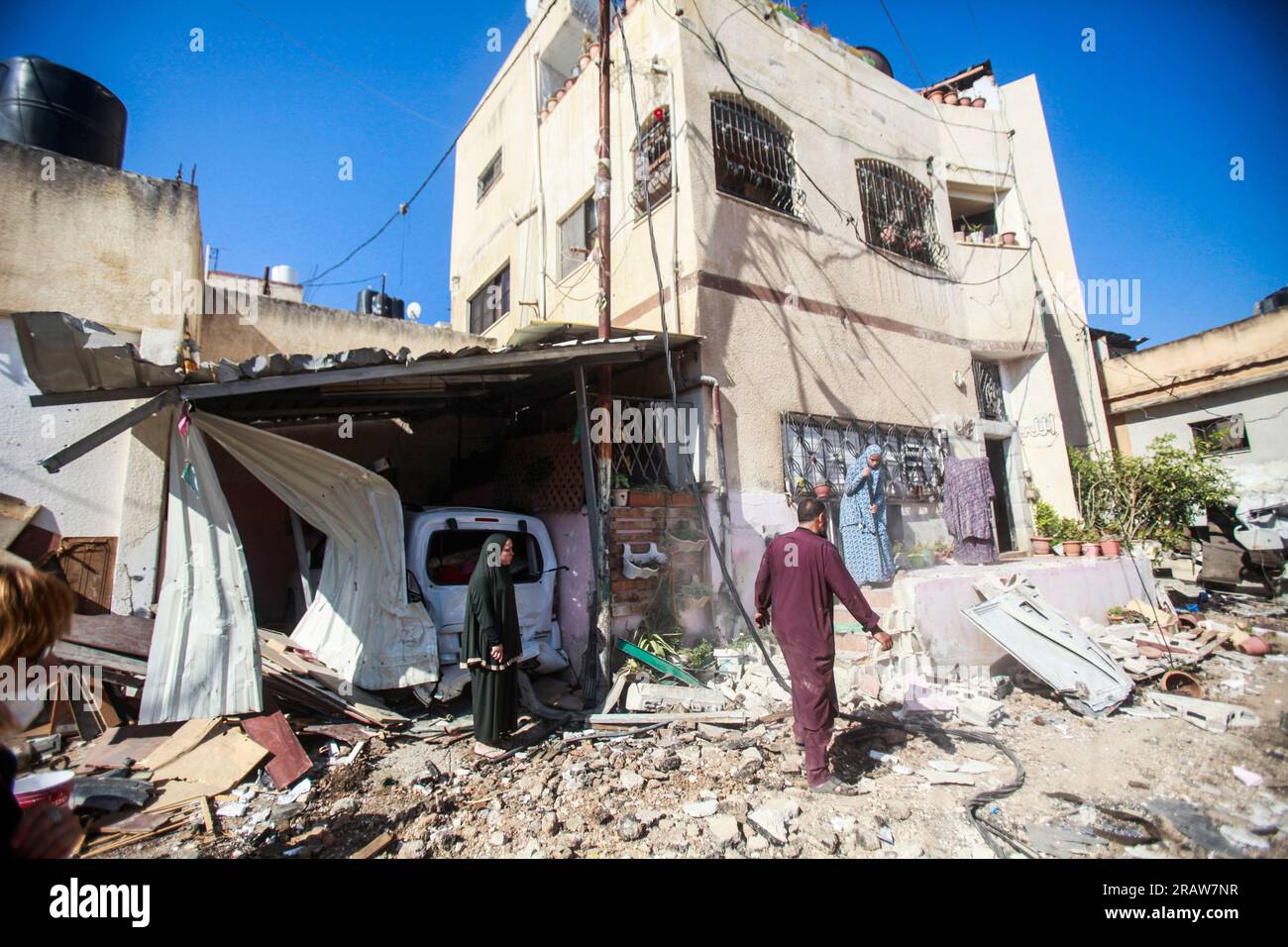Jenin, Palestine. 05th July, 2023. Palestinians inspect their destroyed ...