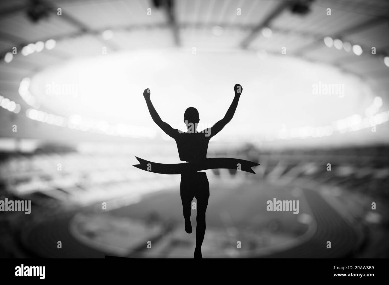 Black and Field Athletics photo. Triumph of Speed: Silhouette of Runner ...