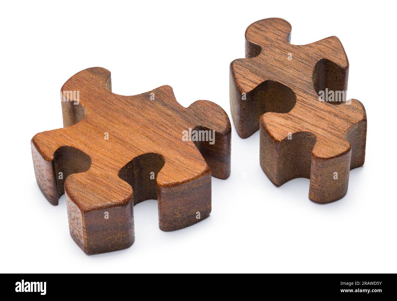 Two wood Puzzel Pieces Cut Out on White Stock Photo - Alamy