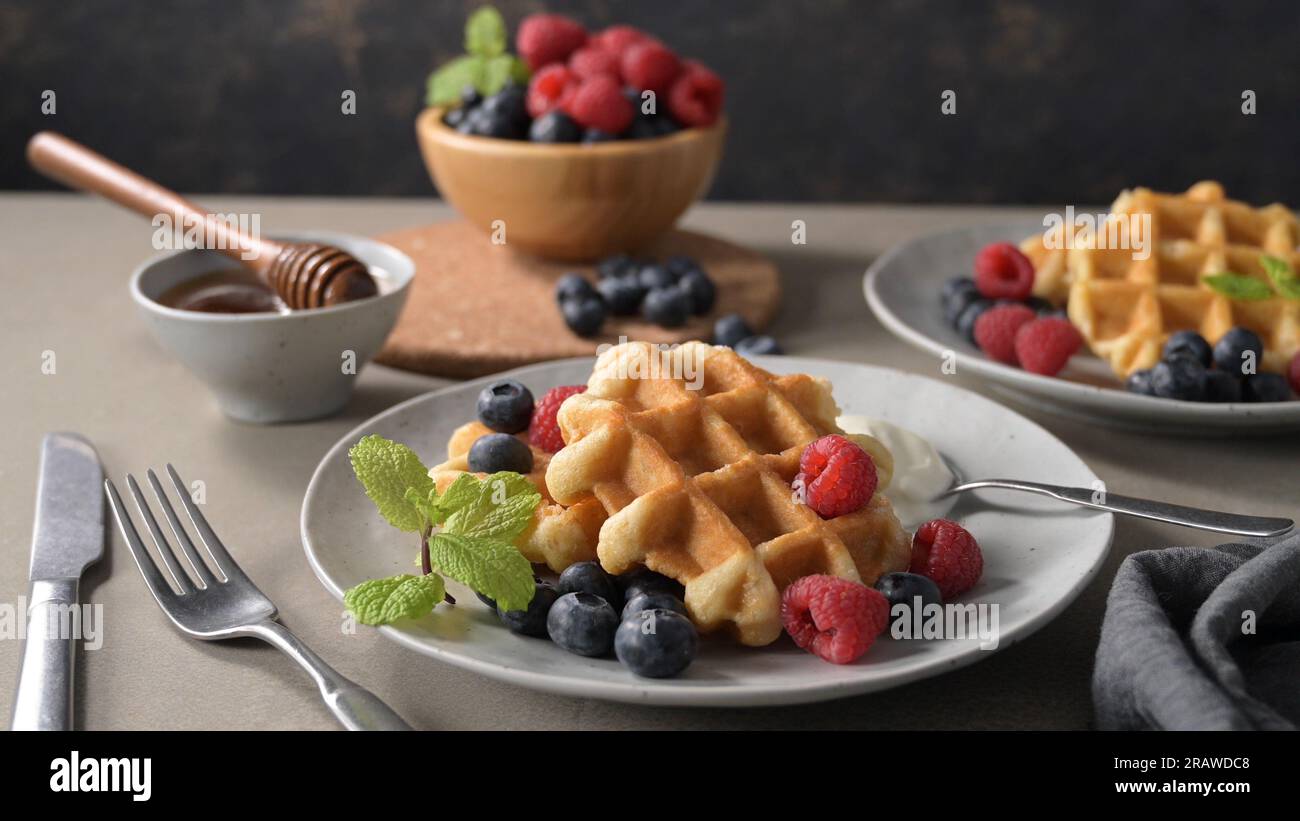 Sweet Homemade Berry Belgian Waffle with Whipped Cream Stock Photo - Alamy