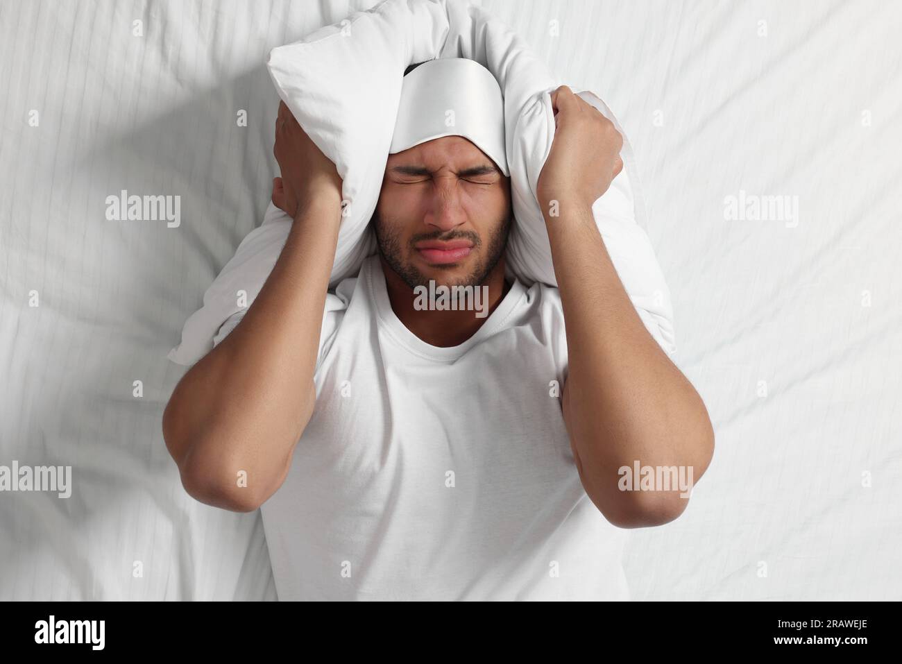 African man sleeping on bed hi-res stock photography and images - Alamy