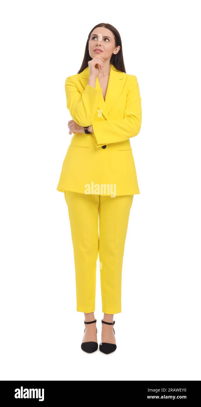 Beautiful businesswoman in yellow suit on white background Stock Photo ...