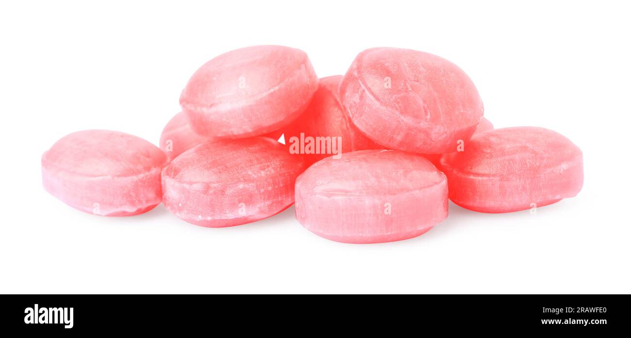 Many pink cough drops on white background Stock Photo - Alamy