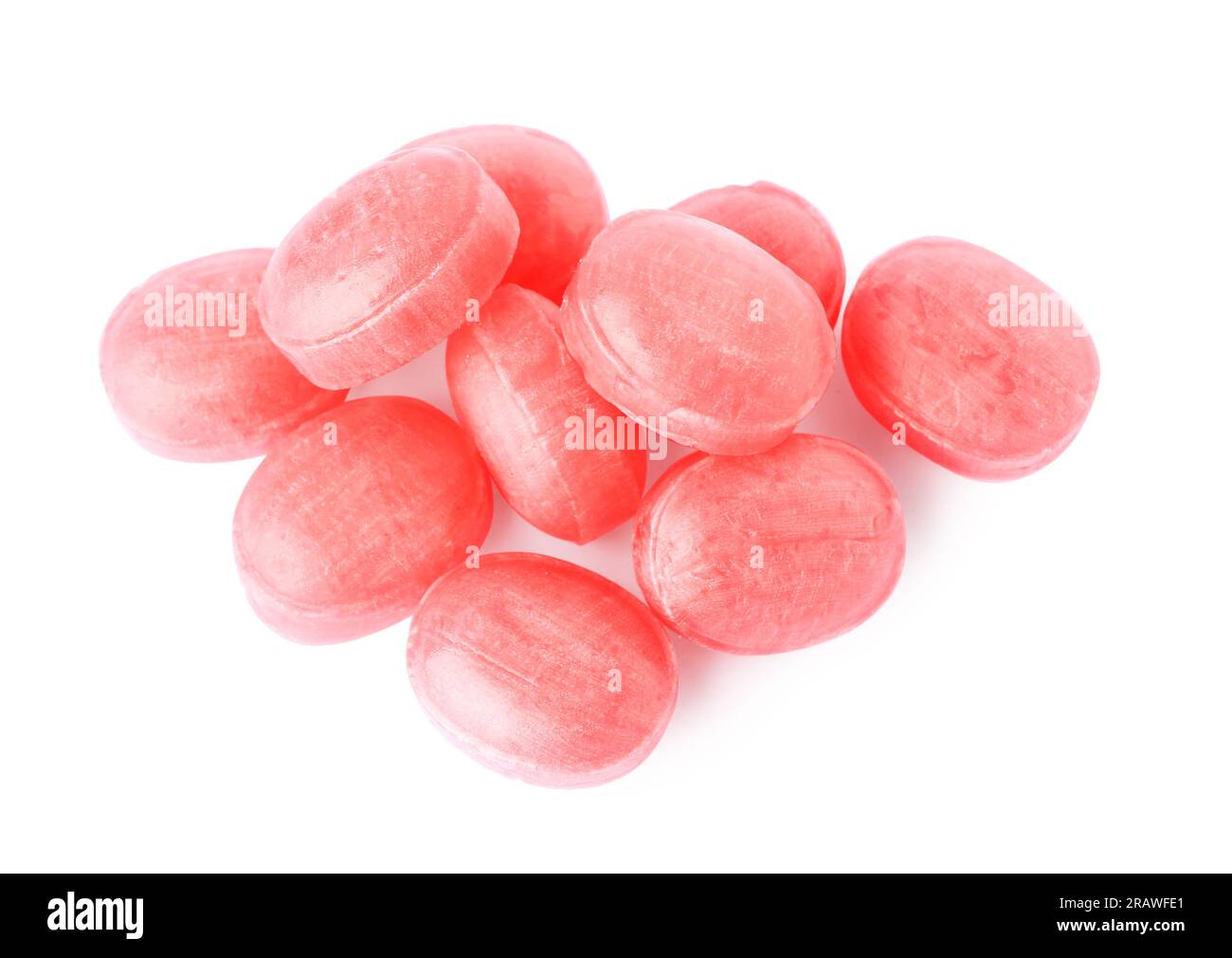 Many pink cough drops on white background Stock Photo - Alamy