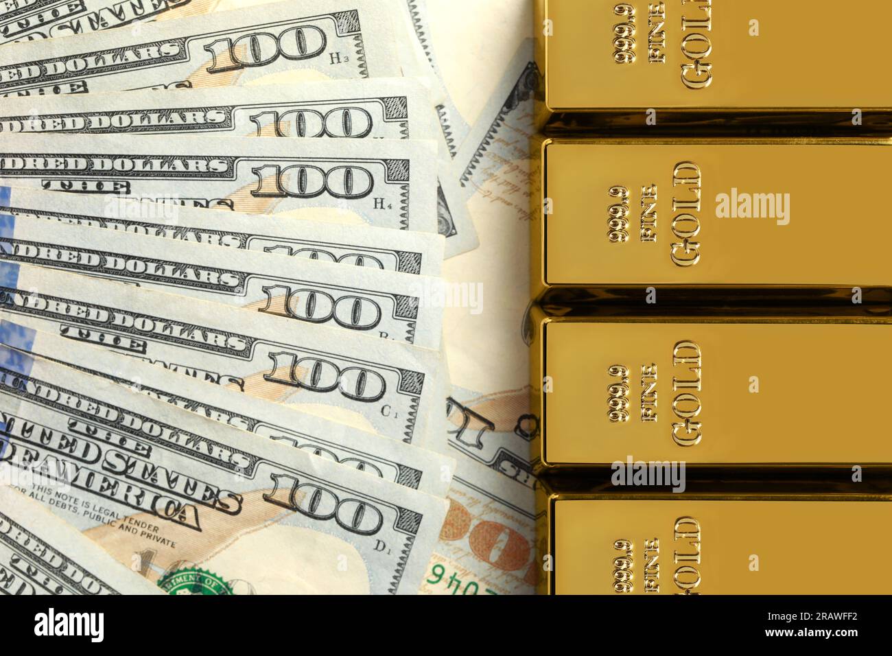Shiny gold bars on dollar banknotes, flat lay. Space for text Stock ...