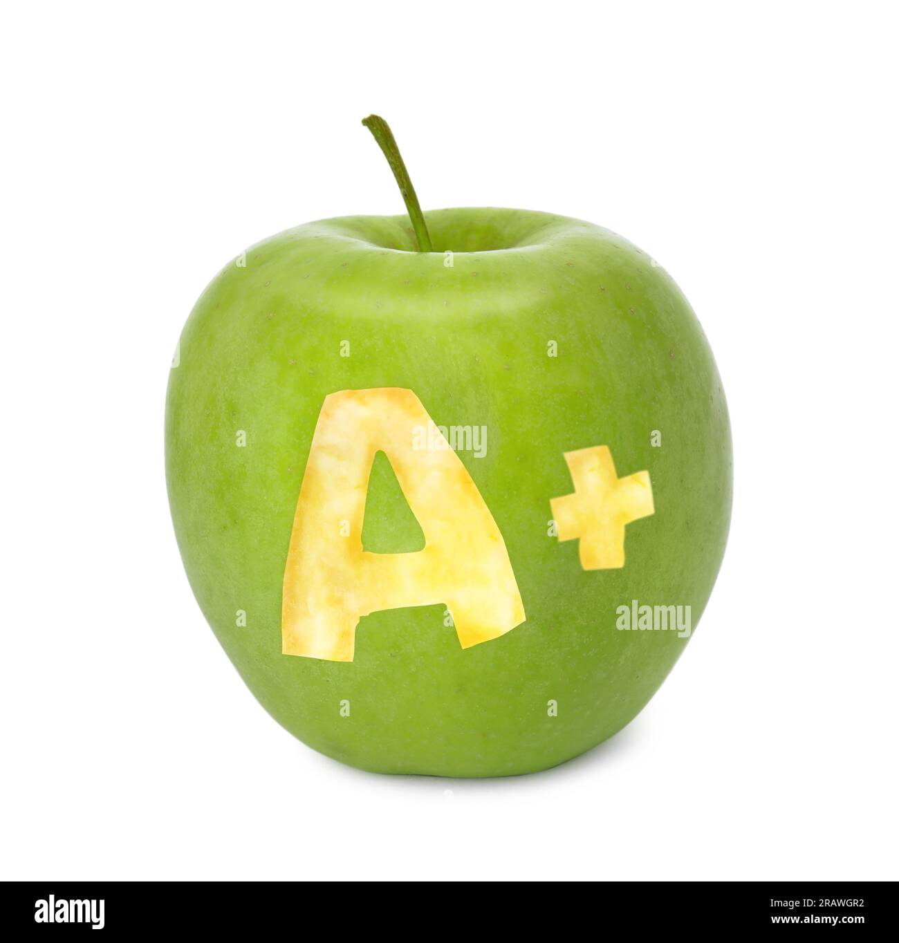 Green apple with carved letter A and plus symbol as school grade on ...