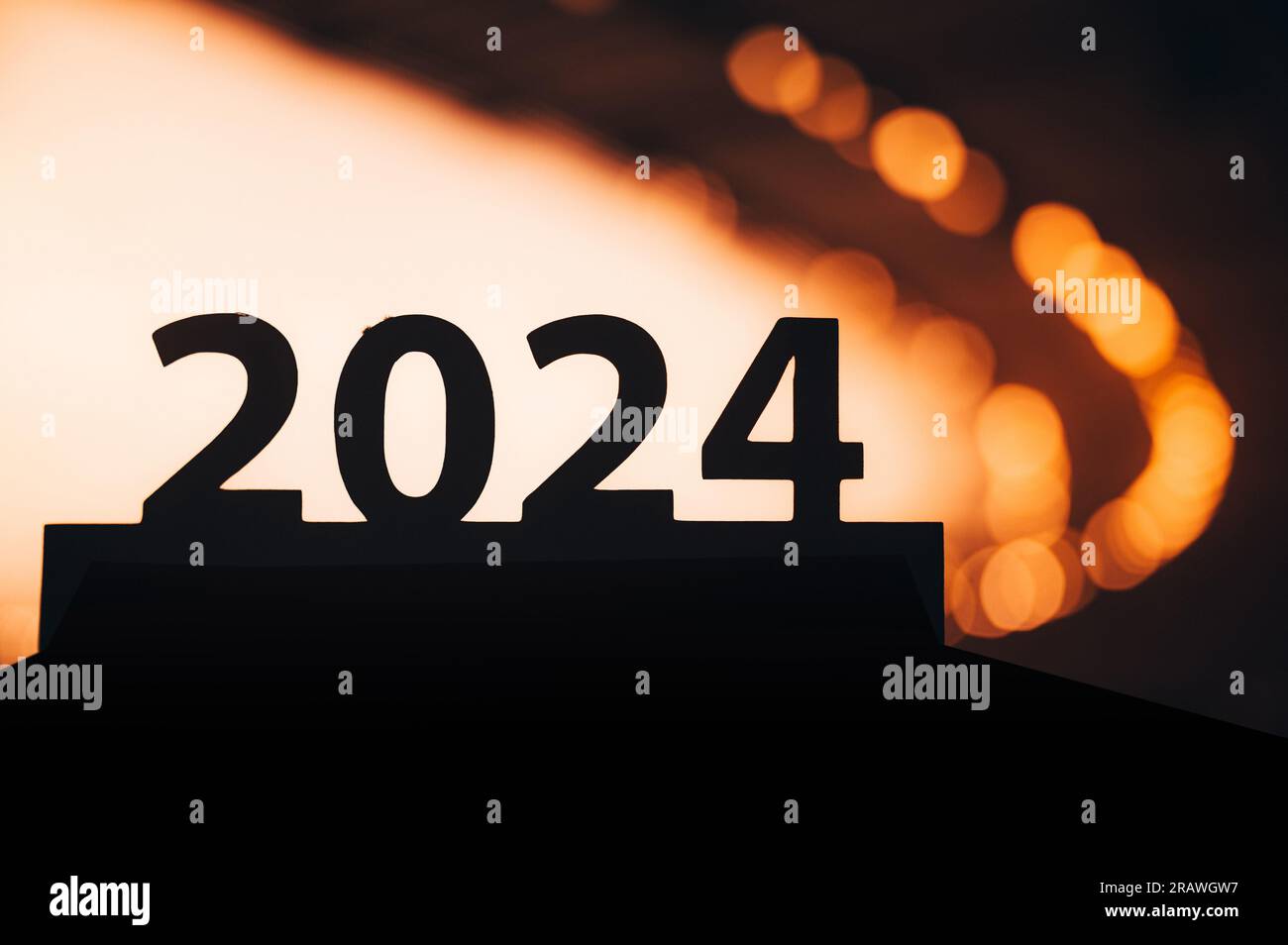 Year of Athletic Excellence: Silhouette of '2024' Sign Shines Against ...