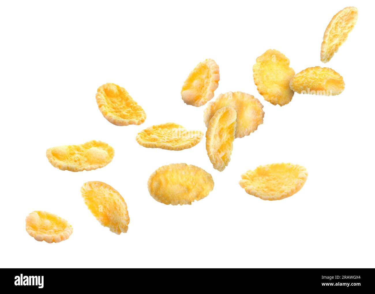 Golden corn flakes falling on white background Stock Photo - Alamy