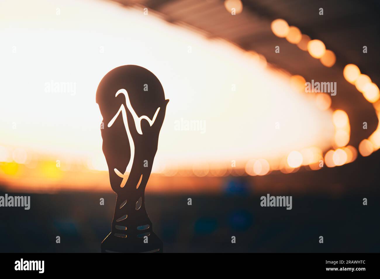 Silhouette of World Football Trophy Shining in Twilight. Photo for ...