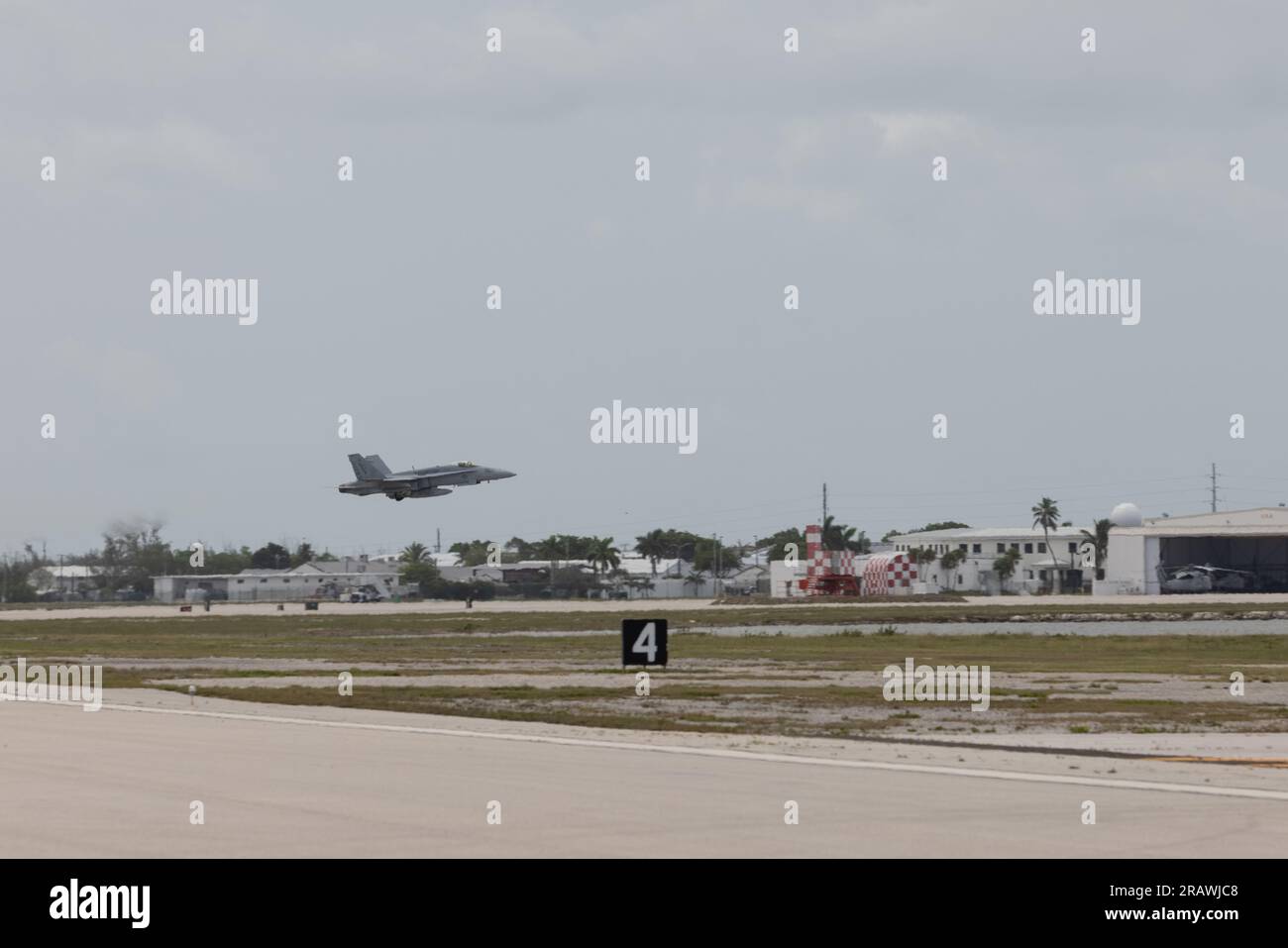 An F/A-18 Hornet with Marine All Weather Fighter Attack Squadron (VMFA ...