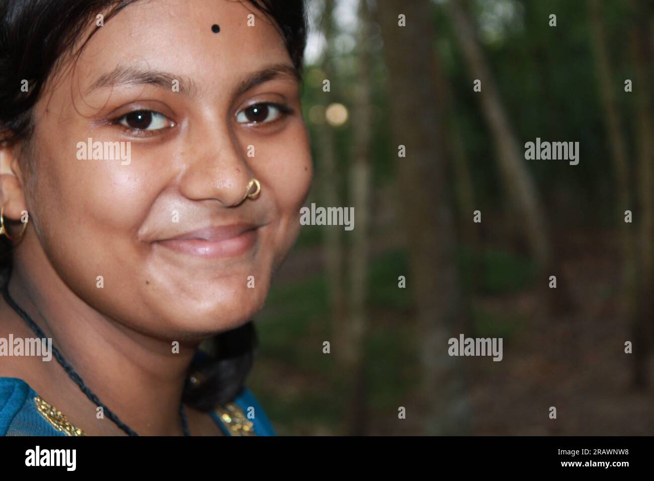 Beautiful indian girl looking camera hi-res stock photography and ...
