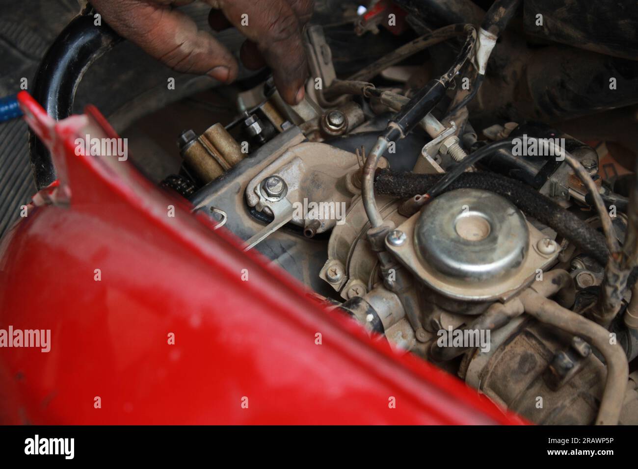 Man repairing a small motor hi-res stock photography and images - Alamy