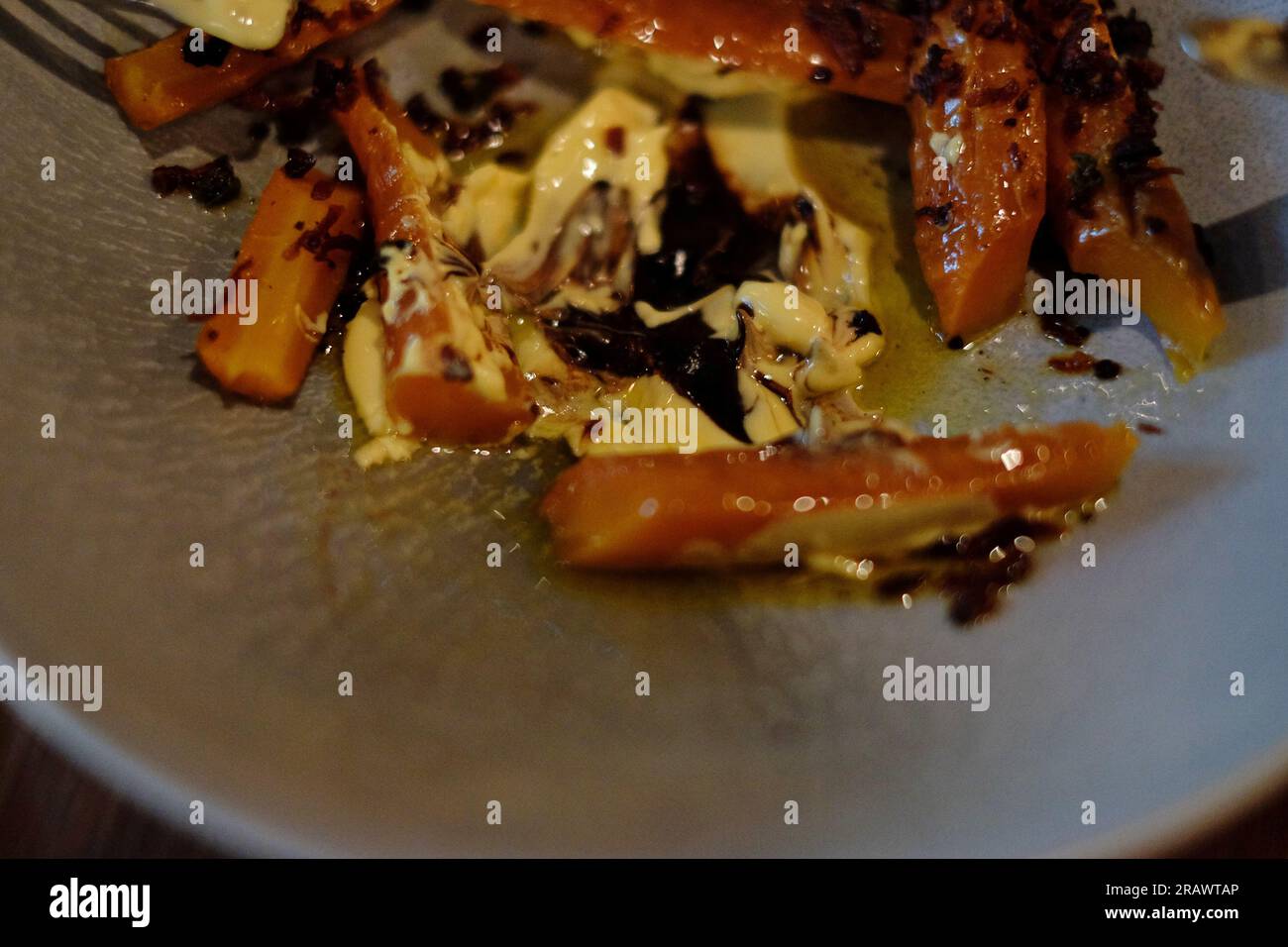 Vegan fine dining, a close-up of Smoked Carrot with Whipped Tofu and ...