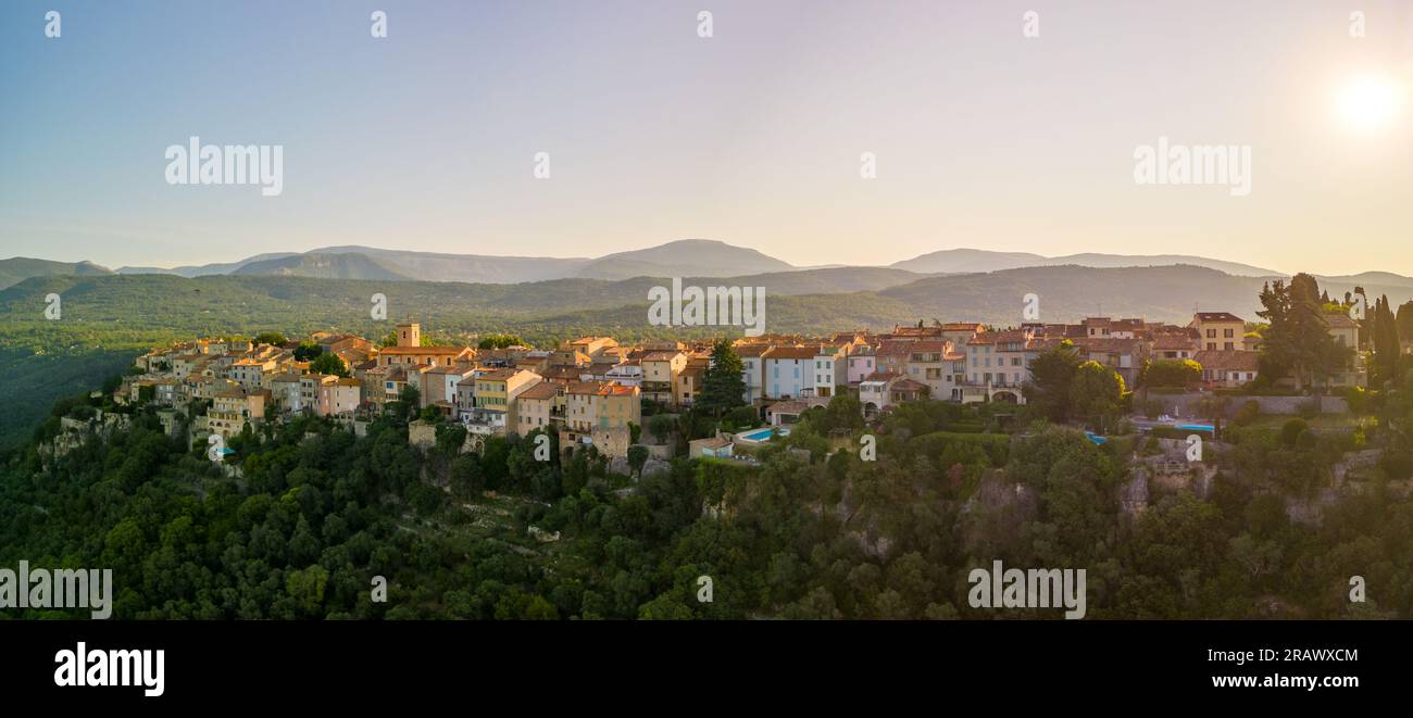 Early morning sun hits historic buildings in French mountain village ...