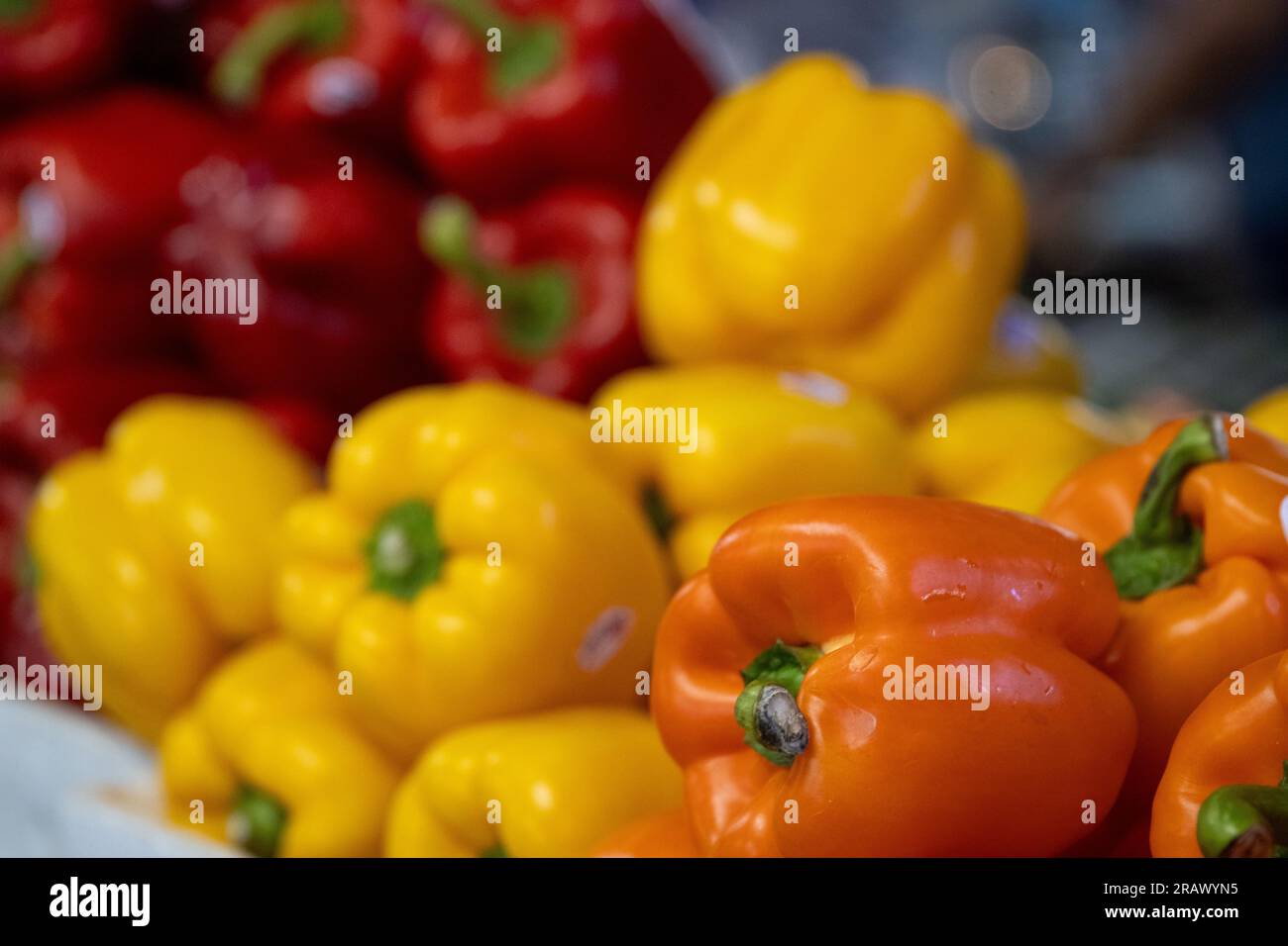 Organic Bell Peppers at a market stall Stock Photo - Alamy