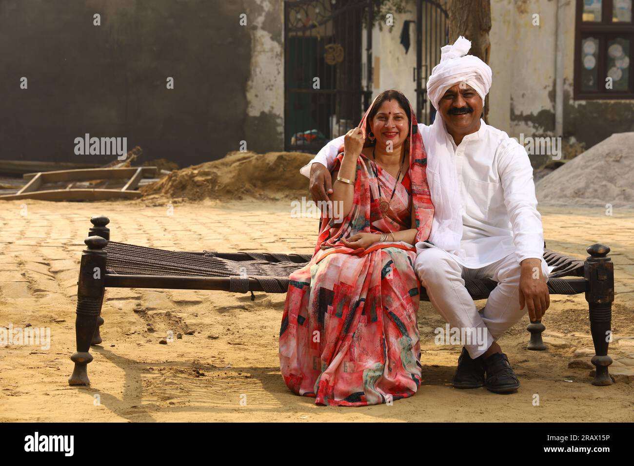 Aged man sitting in Rural Environment wearing kurta-pajama which is ...
