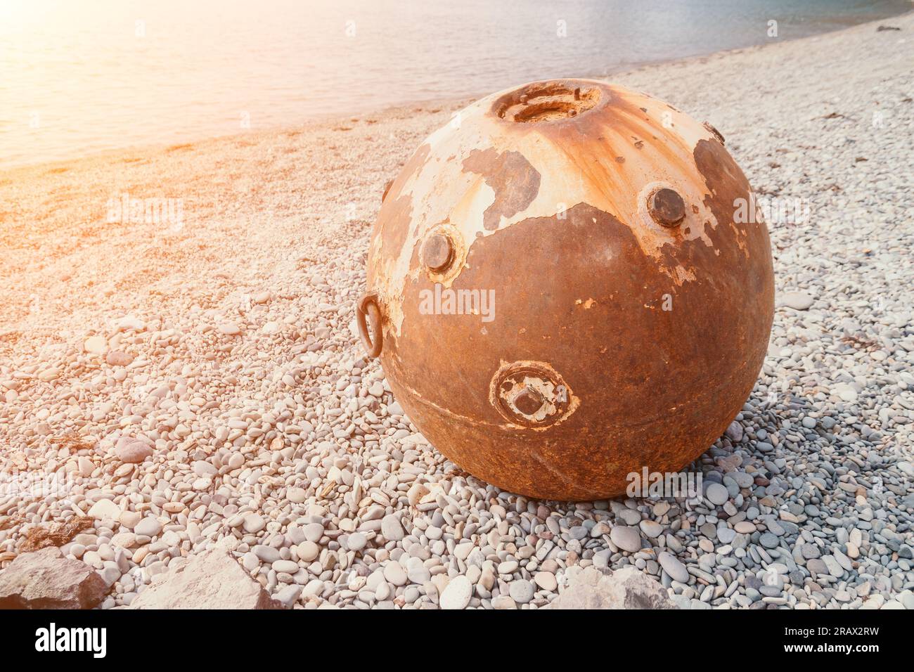 Old rusty sea mine on the beach Stock Photo - Alamy
