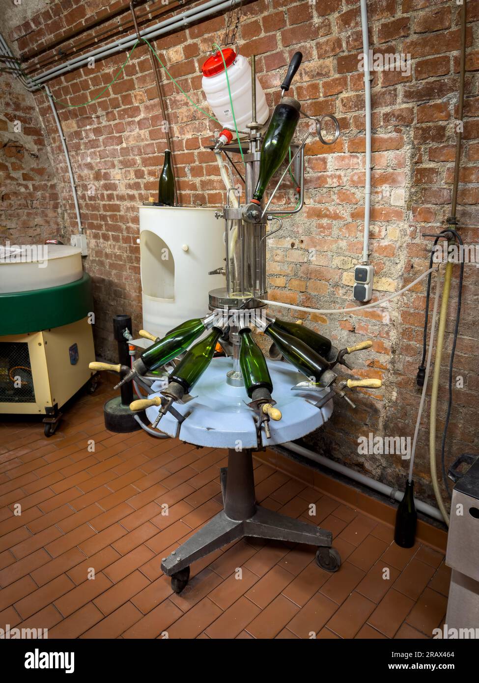 in the sparkling wine cellar there is a machine that is used to ...