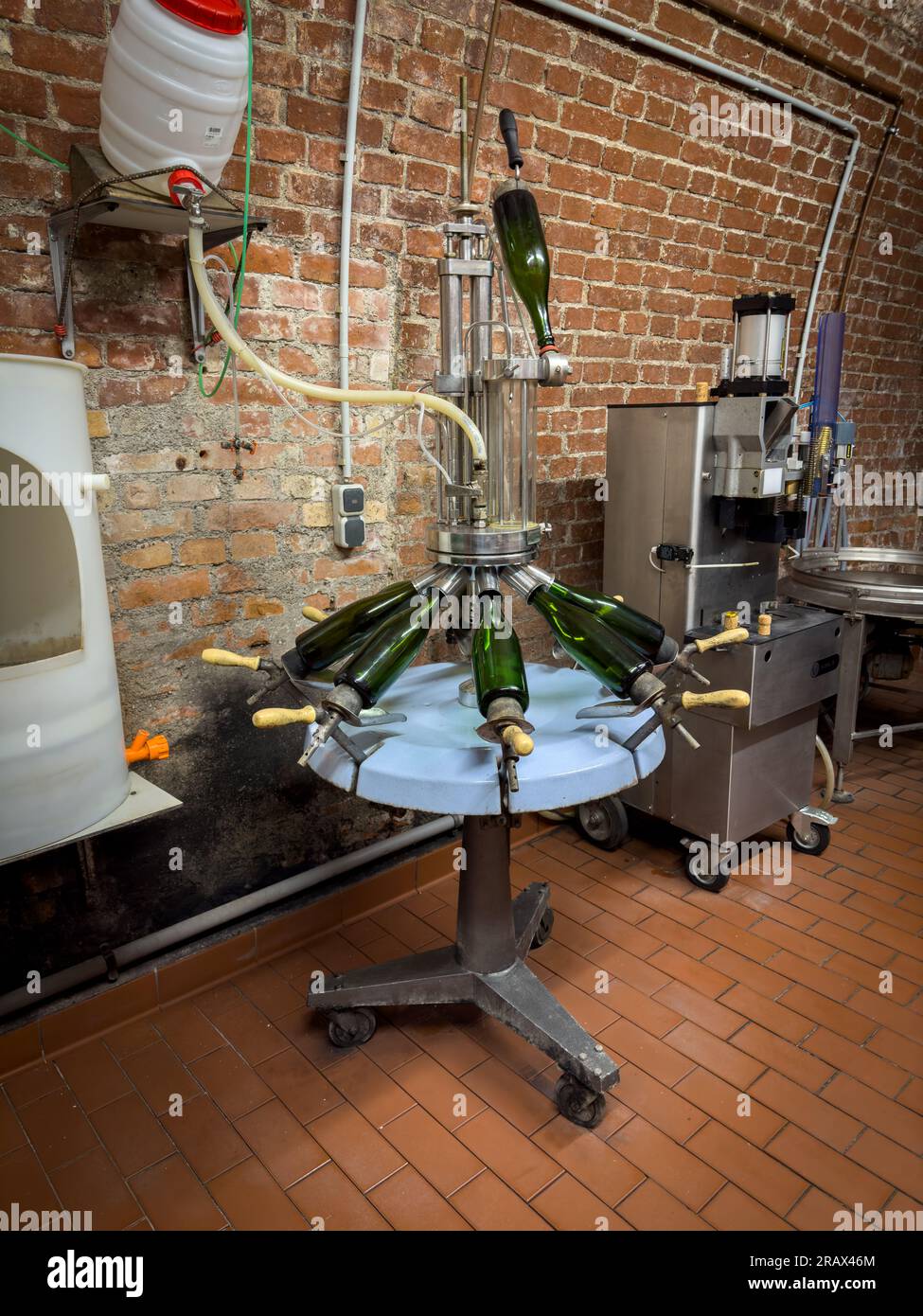 in the sparkling wine cellar there is a machine that is used to ...