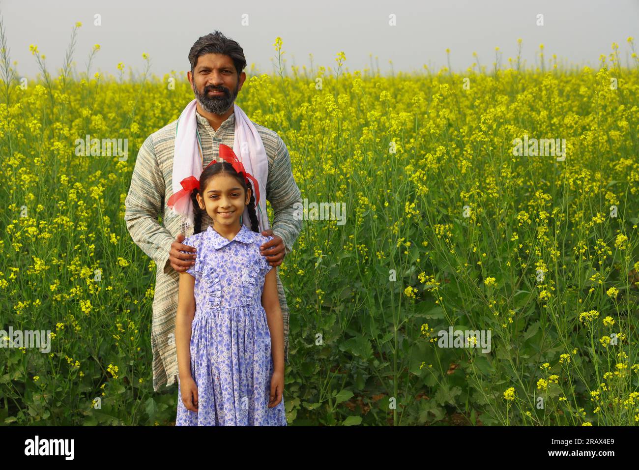Happy rural Indian father and daughter enjoying together while playing ...