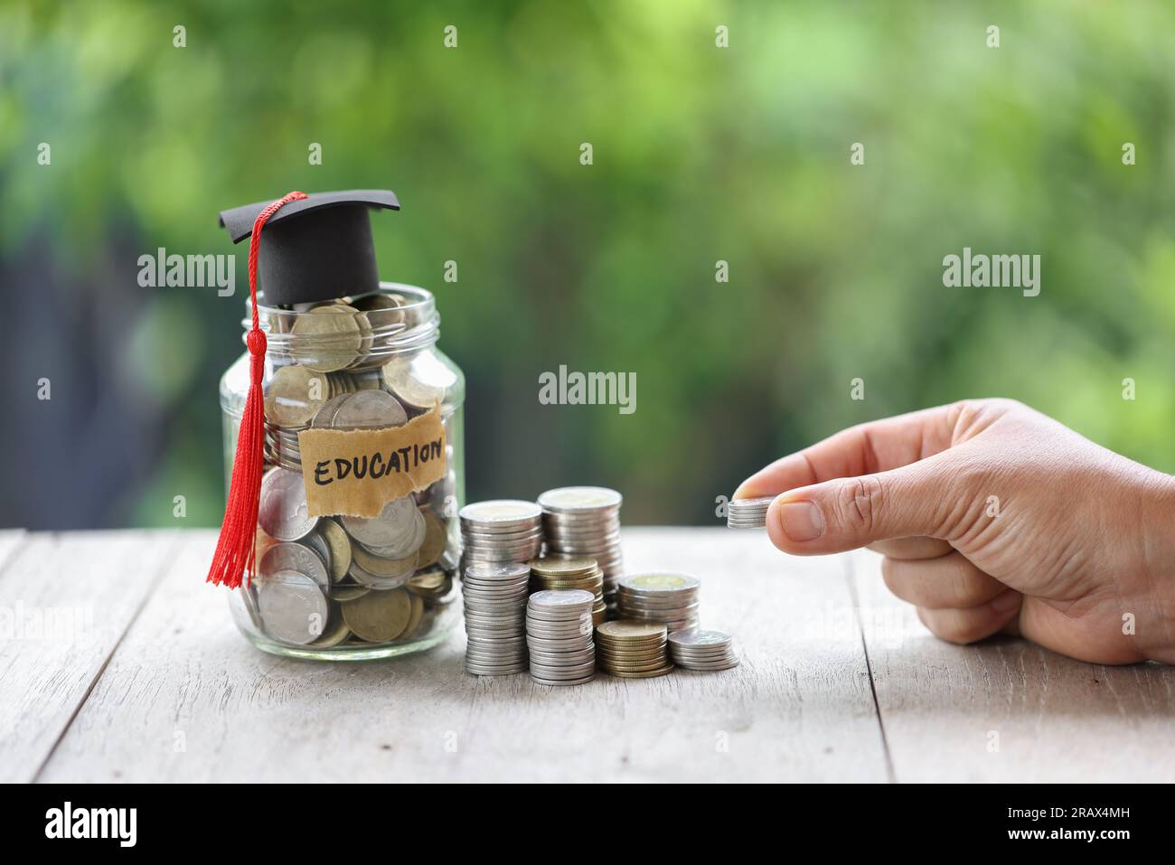 Knowledge and Success: Graduation Cap on Books Against a Beautiful ...