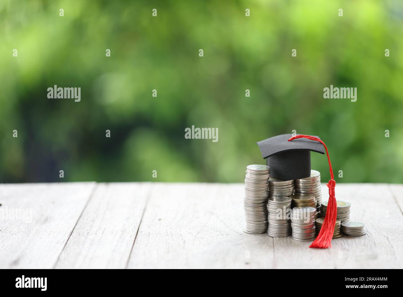 Knowledge and Success: Graduation Cap on Books Against a Beautiful ...
