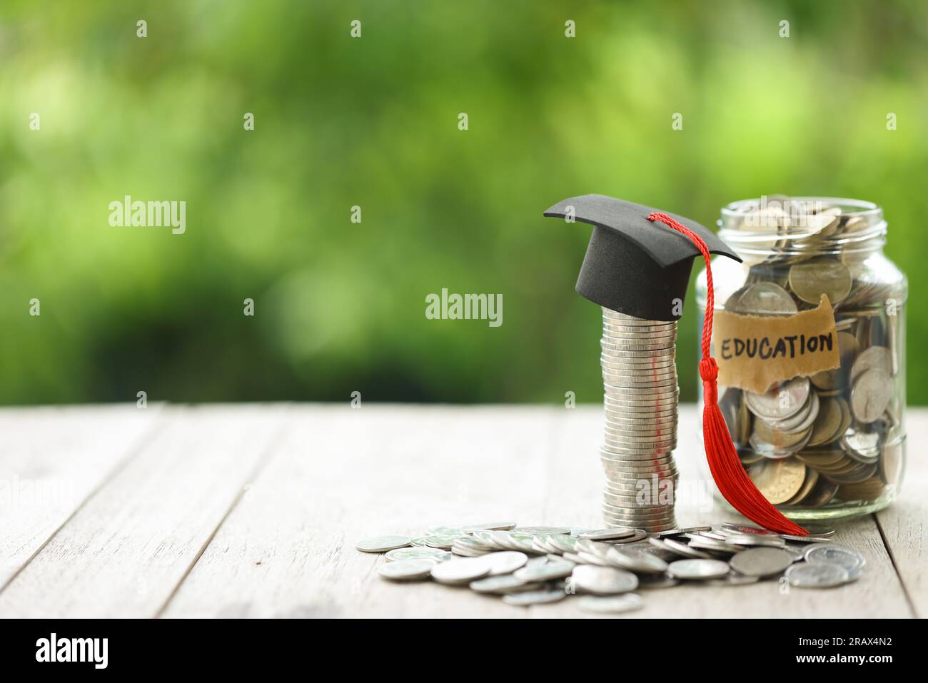 Knowledge and Success: Graduation Cap on Books Against a Beautiful ...