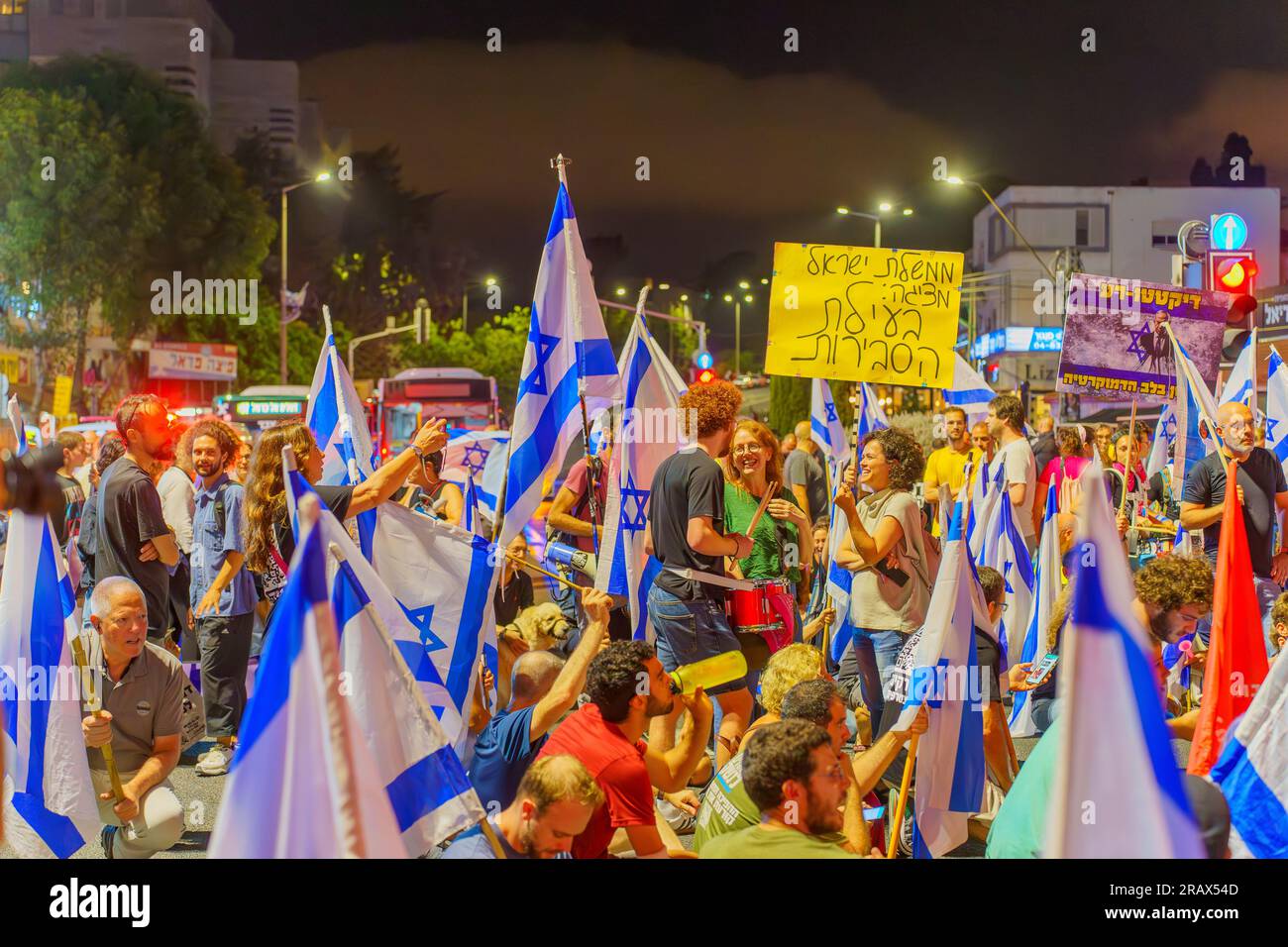 Haifa, Israel - July 05, 2023: People protesting with flags, and ...