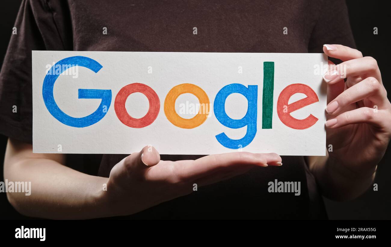 Google logo web search engine hands software sign Stock Photo - Alamy