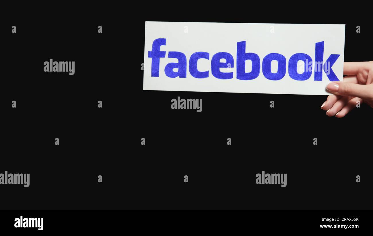 Facebook logo social network influence hands sign Stock Photo - Alamy