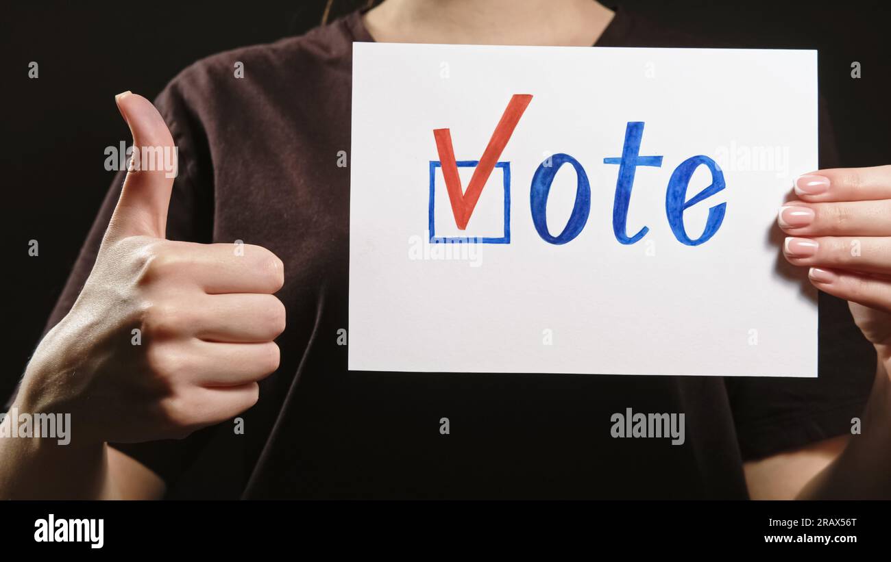 Vote bulletin choice approval hand thumb up check Stock Photo - Alamy