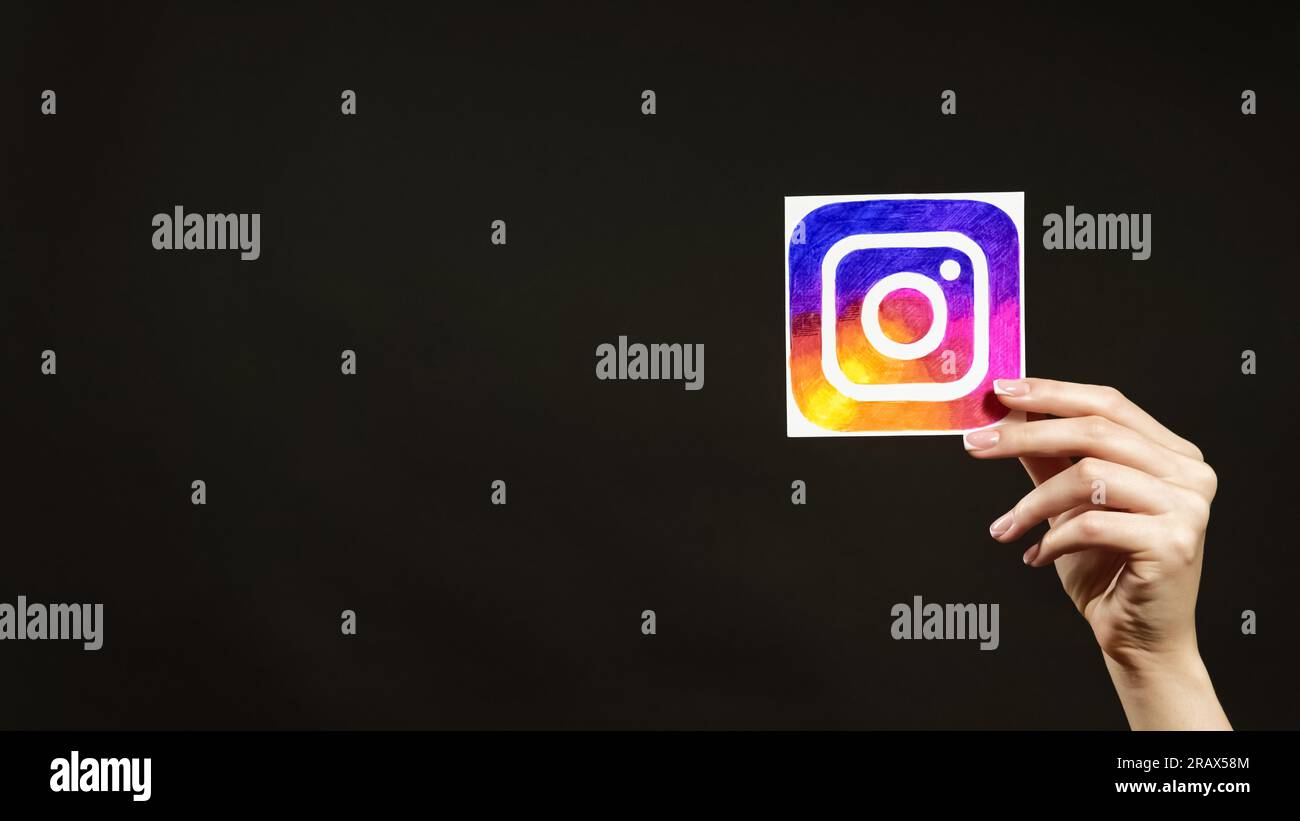 Instagram icon social media application hand logo Stock Photo - Alamy