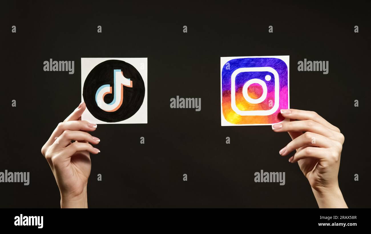 Social media follow network tiktok instagram hands Stock Photo - Alamy